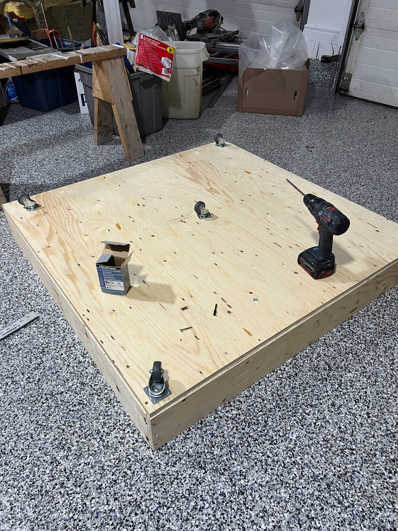 How to Make Your Own Simple DIY Garage Storage - Erin Zubot Design